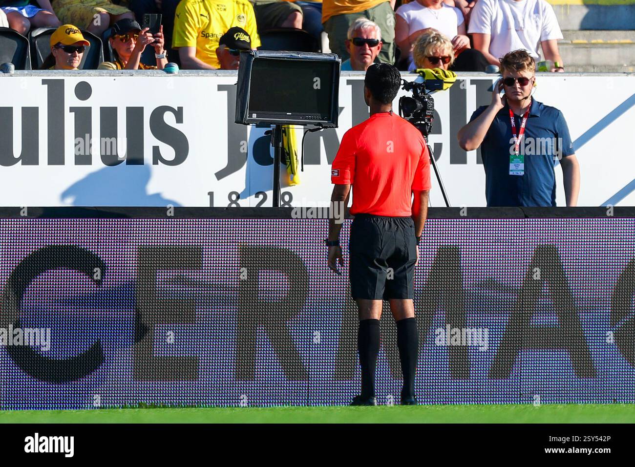 FILE - Referee Mohammad Usman Aslam checks VAR during the football ...
