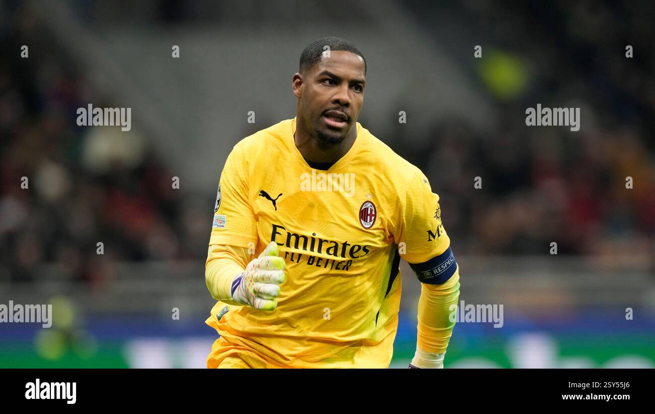 AC Milan's goalkeeper Mike Maignan controls the ball during Champions ...