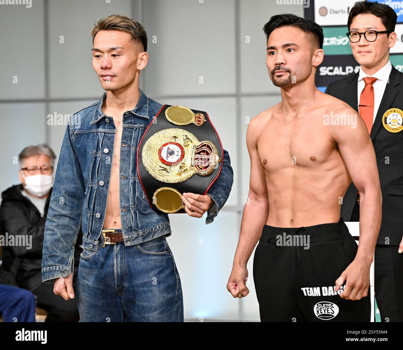 Tokyo, Japan. 23rd Feb, 2025. Champion Seiya Tsutsumi, left, and ...