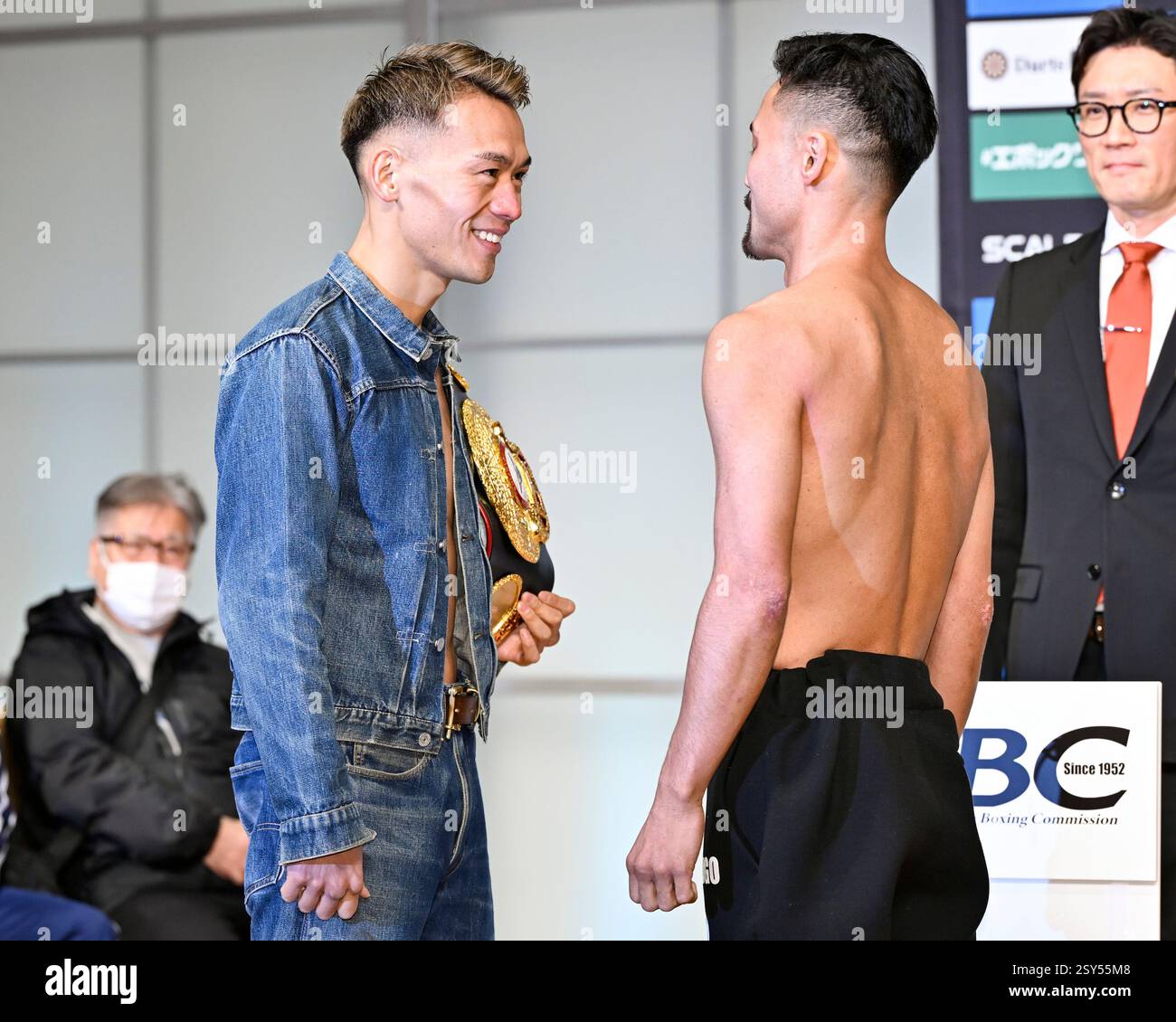 Tokyo, Japan. 23rd Feb, 2025. Champion Seiya Tsutsumi, left, and ...
