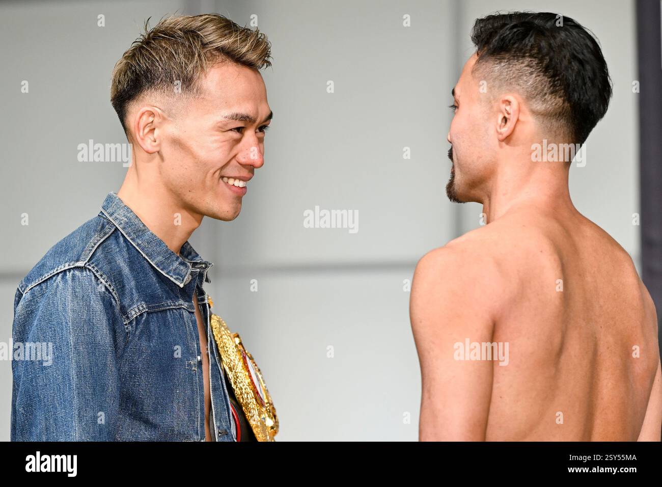 Tokyo, Japan. 23rd Feb, 2025. Champion Seiya Tsutsumi, left, and ...