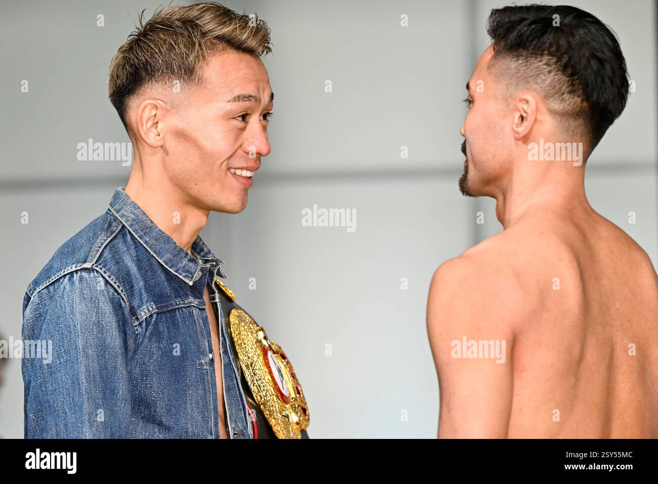 Tokyo, Japan. 23rd Feb, 2025. Champion Seiya Tsutsumi, left, and ...