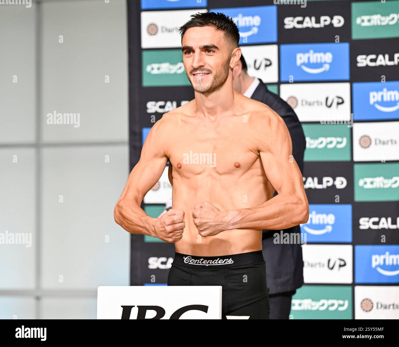 Australia's Jason Moloney poses on the scale during the official weigh ...