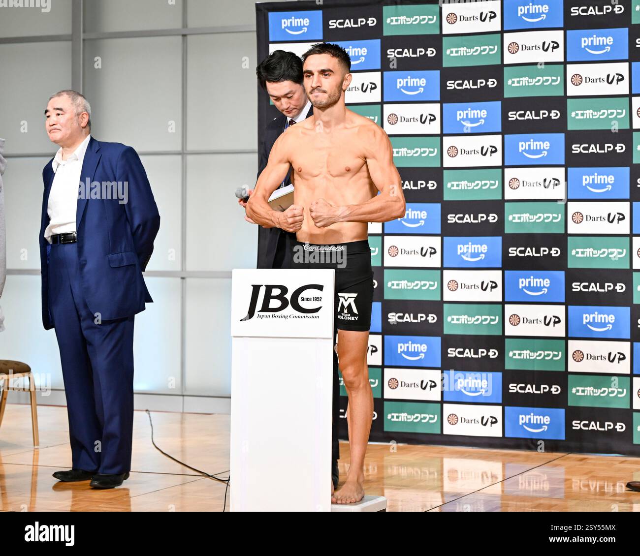Australia's Jason Moloney poses on the scale during the official weigh ...