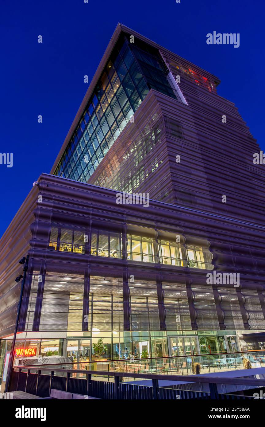 Exterior of the Munch Museum (Munchmuseet / Munch) at dusk in winter ...