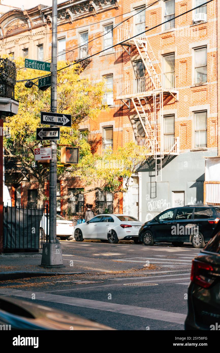 A busy corner in South Williamsburg features classic brownstone ...