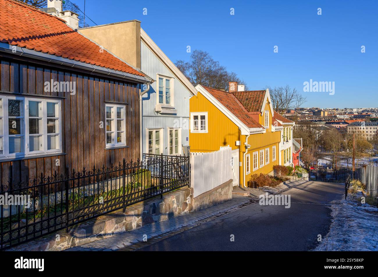 Telthusbakken is a hilly road with well-preserved and inhabited wooden ...
