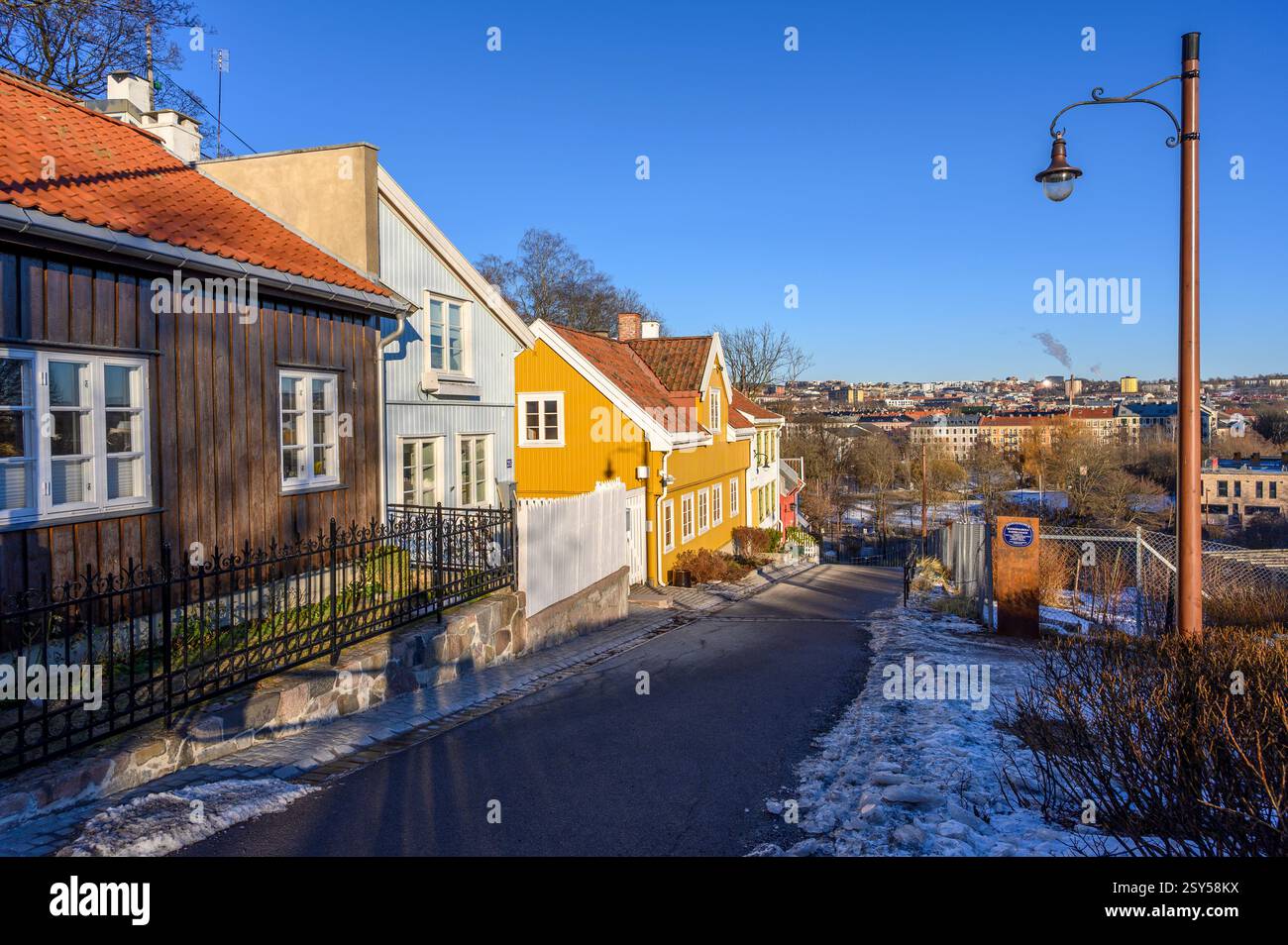 Telthusbakken is a hilly road with well-preserved and inhabited wooden ...