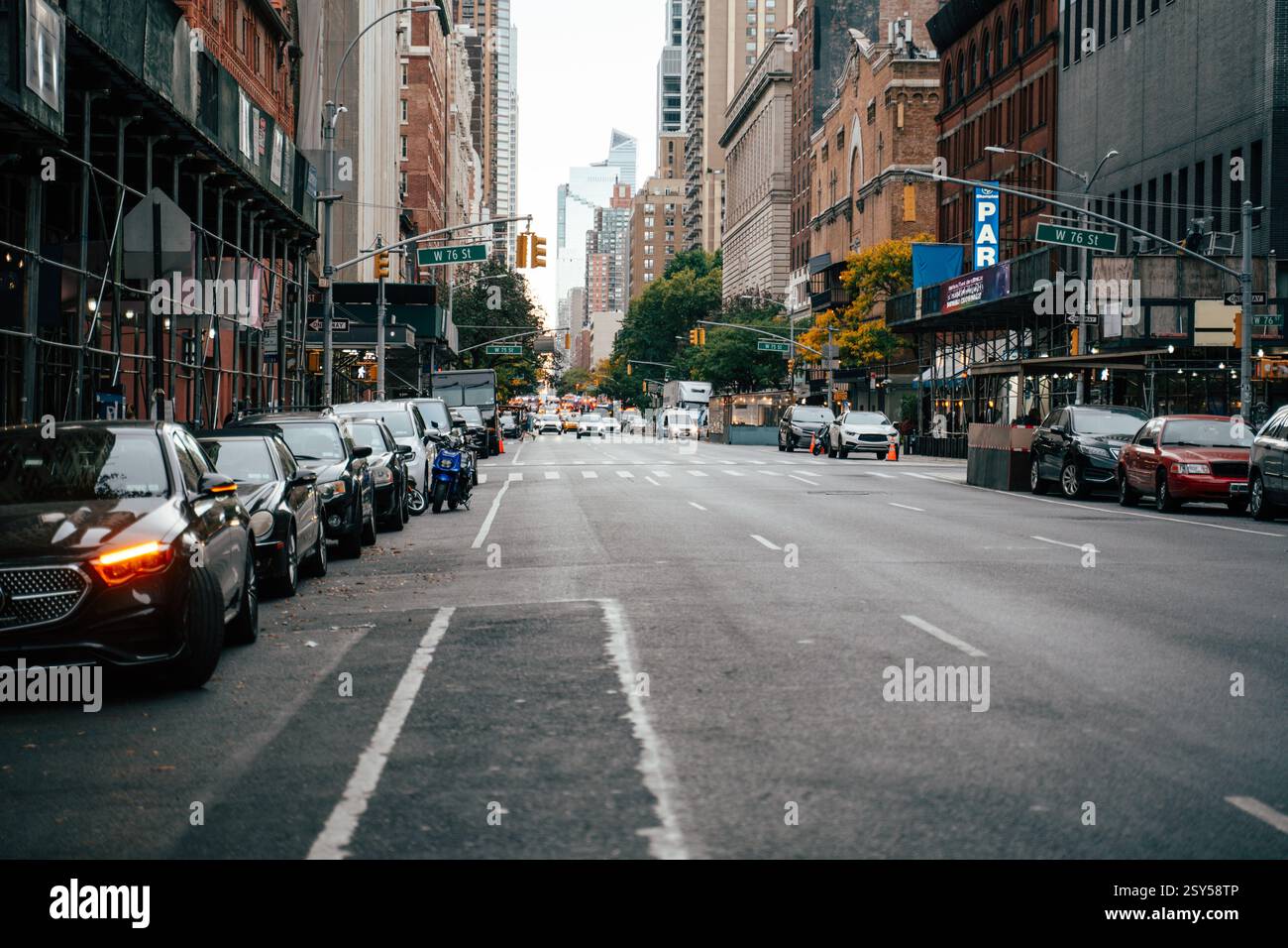 A serene, wide street in the Upper West Side of Manhattan showcases ...