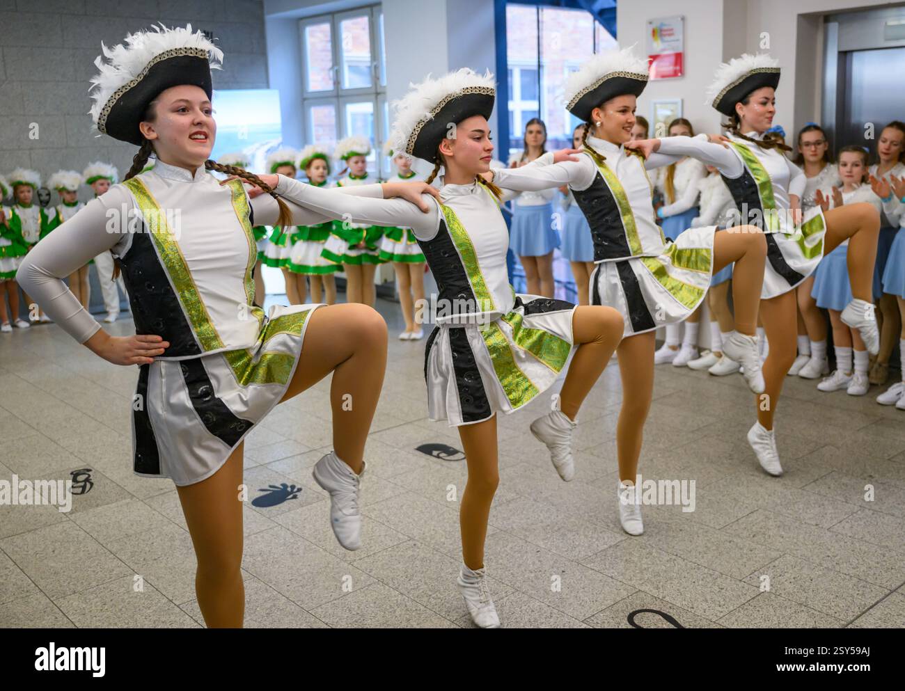 Cottbus, Germany. 27th Feb, 2025. Girls dance in the town hall for the ...