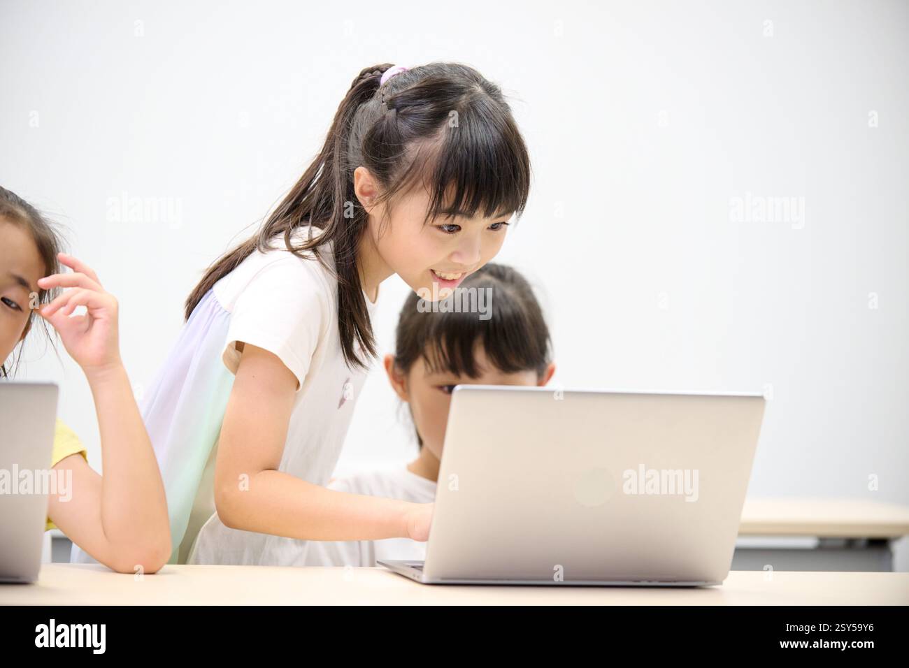 Japanese kids using laptops Stock Photo - Alamy