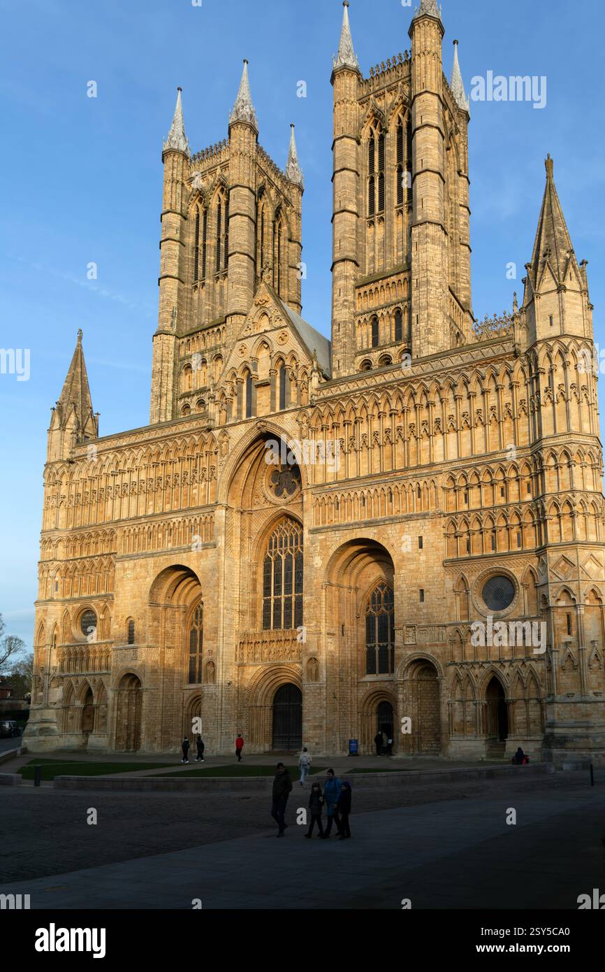 West frontage of cathedral church in evening light, Lincoln ...