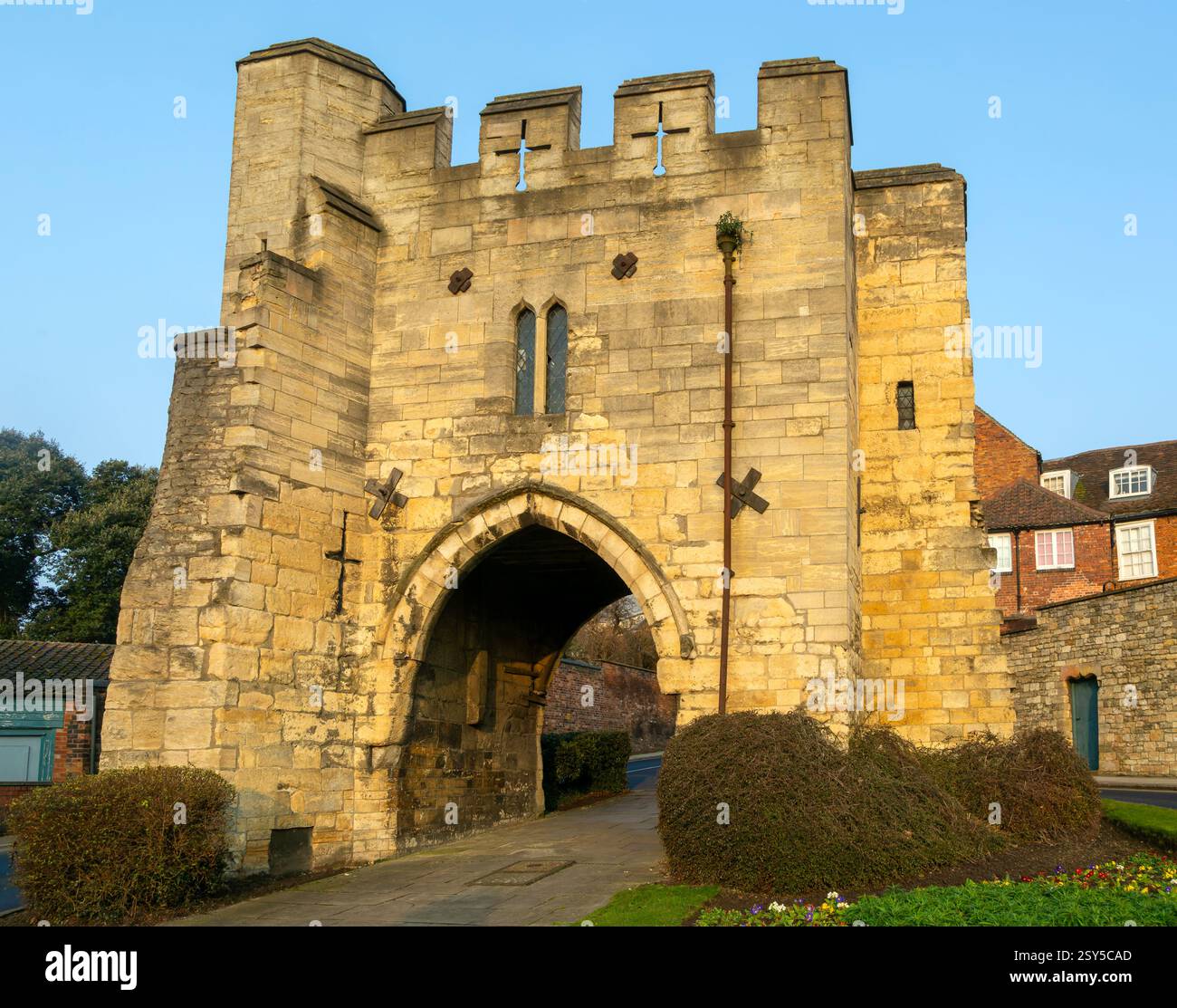 Pottergate medieval stone archway entrance to cathedral area in city of ...