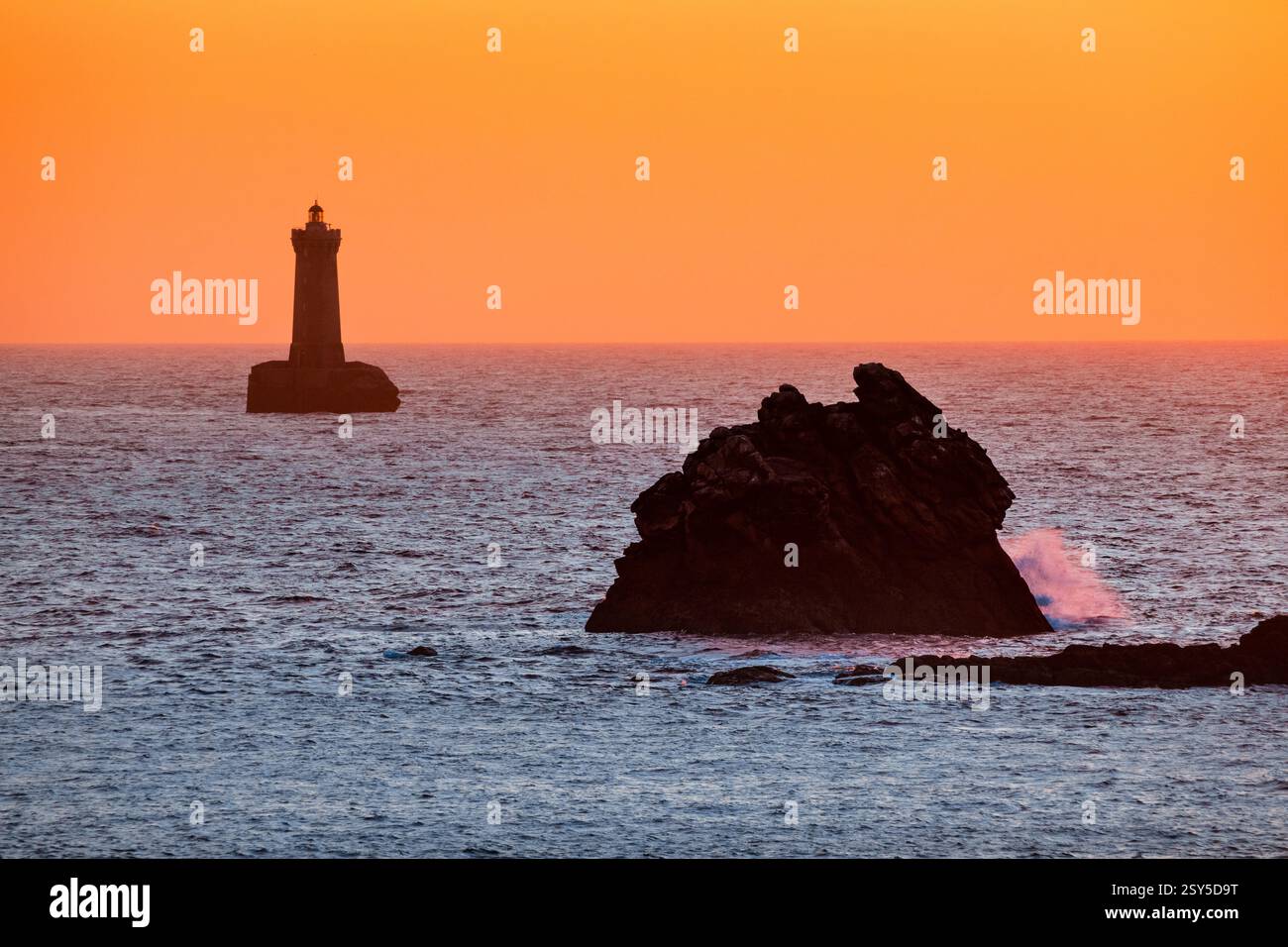 Phare du Chenal du Four lighthouse at sunset, France, Brittany ...
