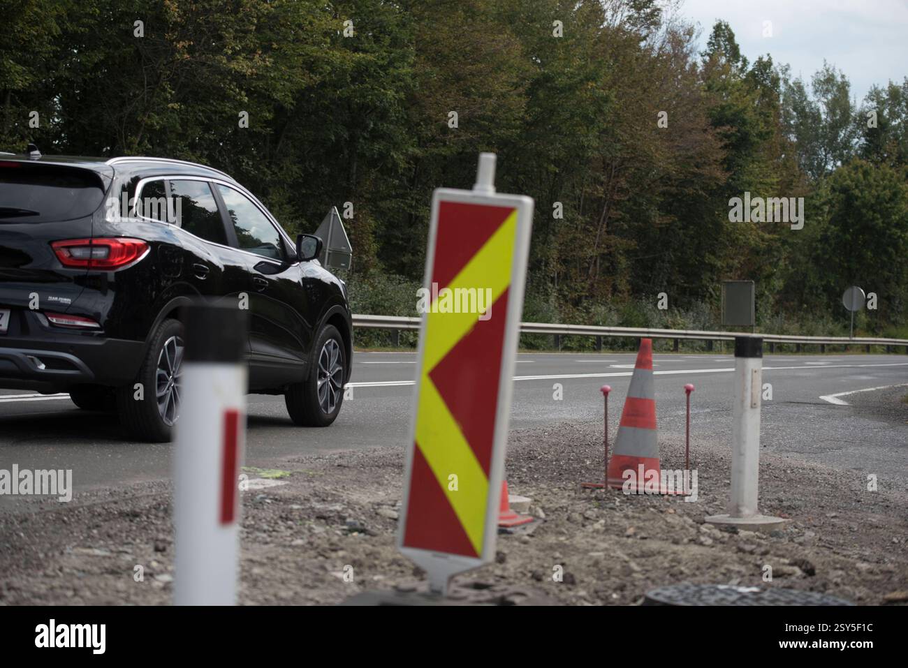 Direction sign with arrow showing the way in road traffic Direction ...