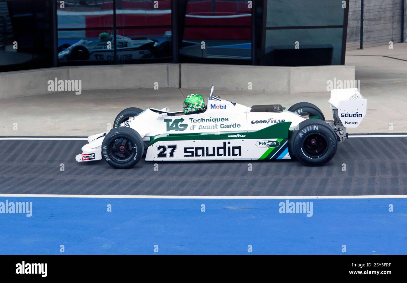 Mike Wrigley, driving his Green and White, 1980, Williams FW07D, back ...