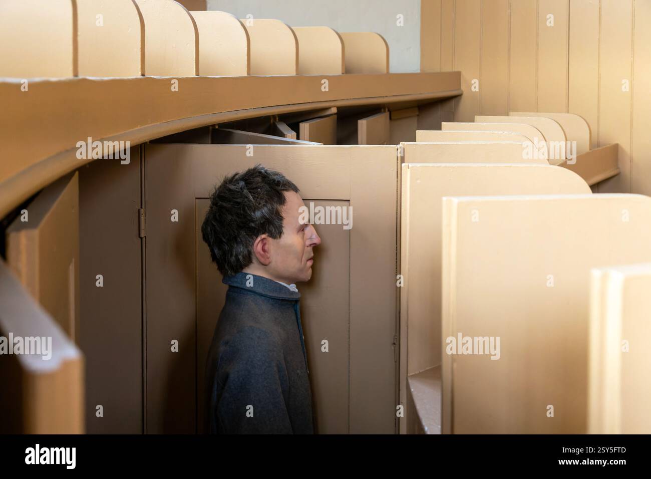 Wooden stalls interior of prison chapel Victorian jail museum, Lincoln ...