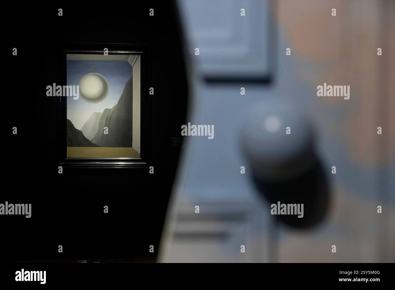 A painting "La reconnaissance infinie" created by artist Rene Magritte ...