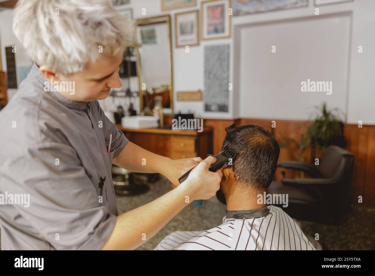 Modern Barber Styling A Skillfully Executed Haircut in Progress with ...