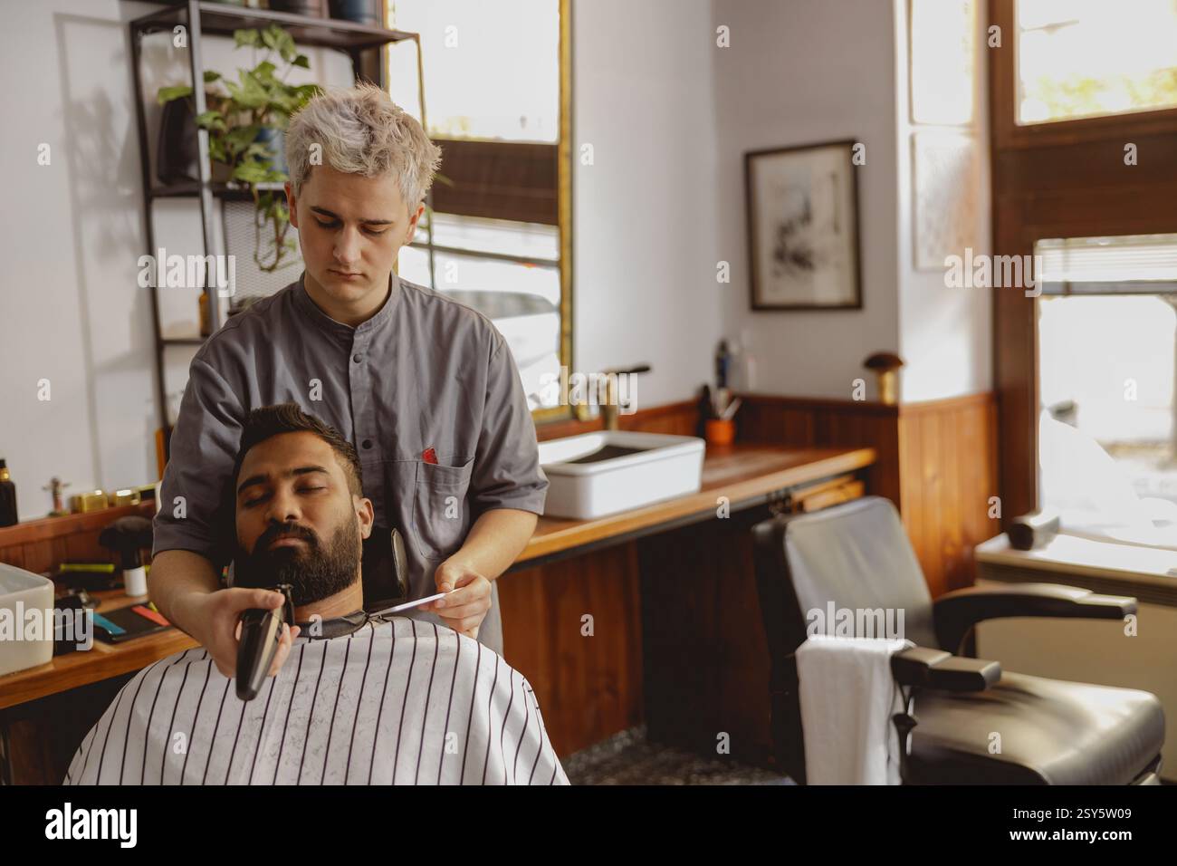 Enjoy a contemporary barbershop experience featuring a stylish barber ...