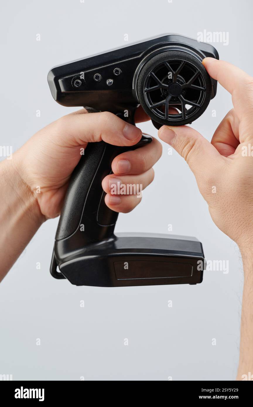 Using RC joystick close up view isolated on white studio background ...