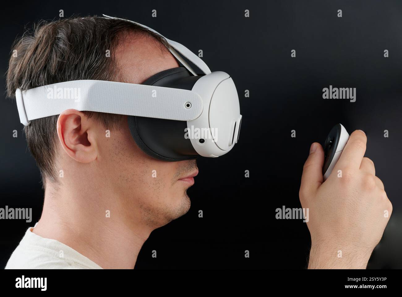 Man working in Virtual reality with joystick side view isolated on ...