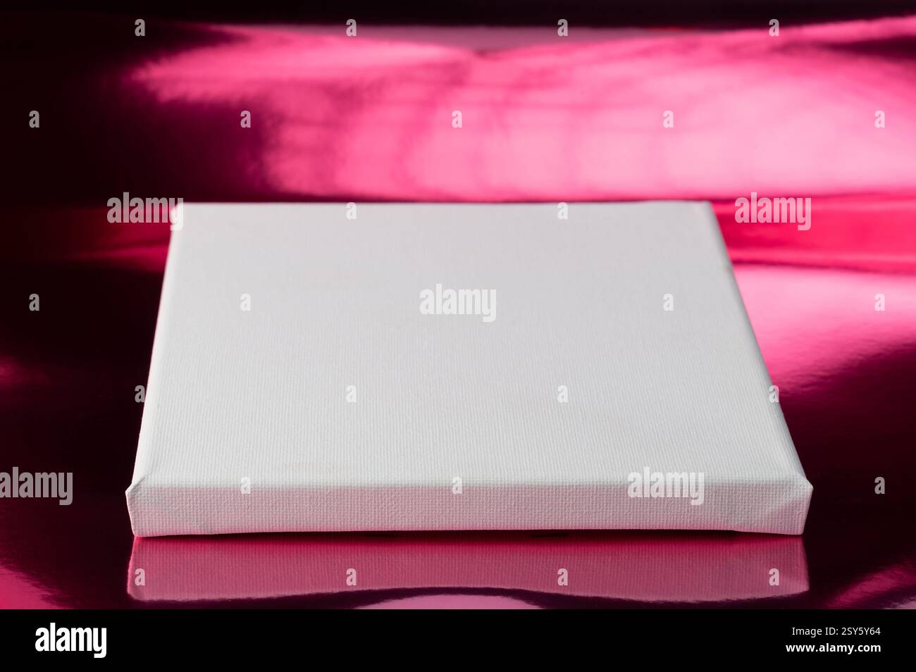 White pedestal box stand on pink reflective background Stock Photo - Alamy