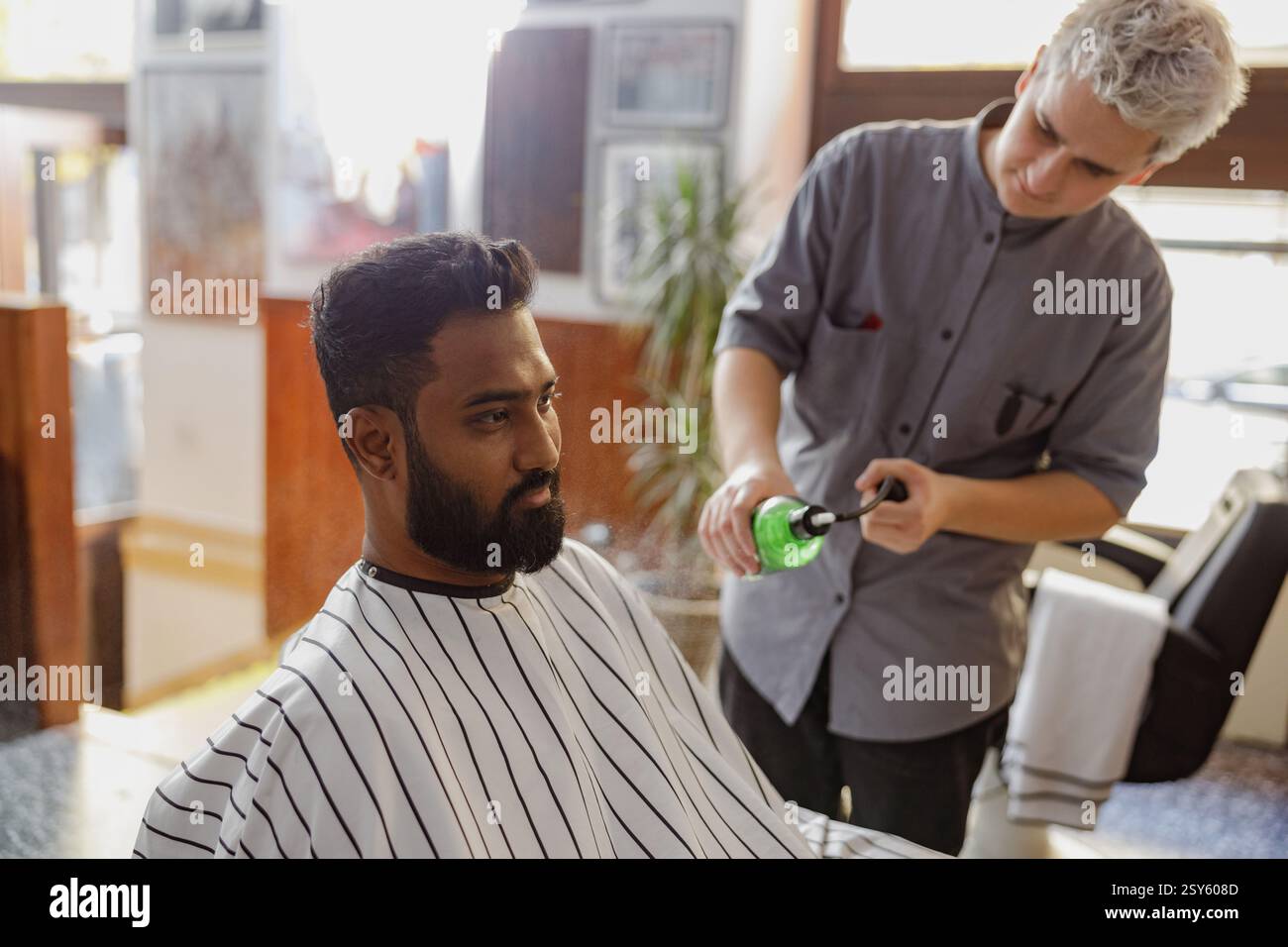 Barbershop Scene A Stylish Haircut in Progress at a Local Barber Shop ...