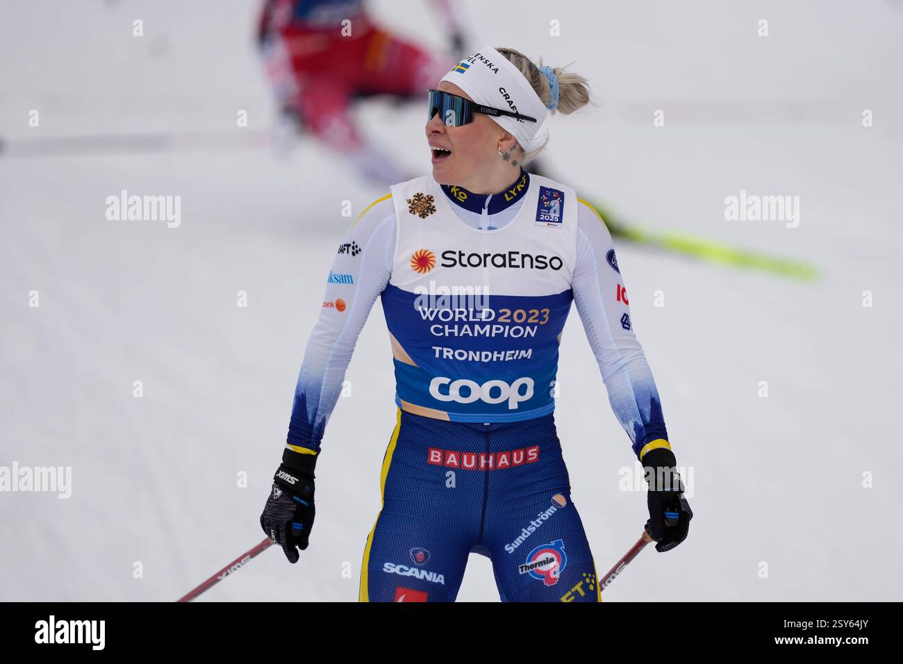 Jonna Sundling of Sweden celebrates as she crosses the finish line ...