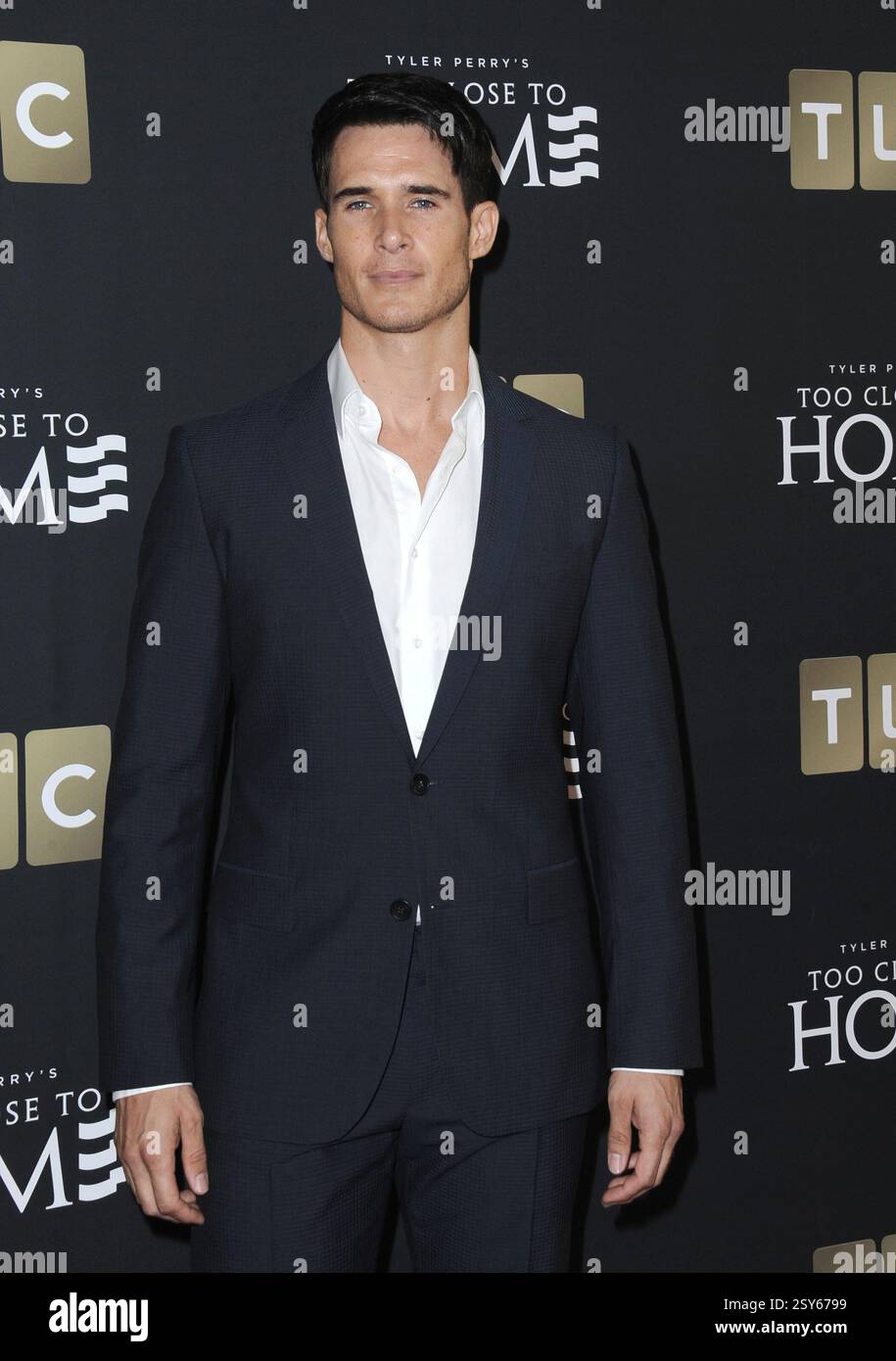 Nick Ballard arriving at a screening of 'Too Close To Home' at The ...
