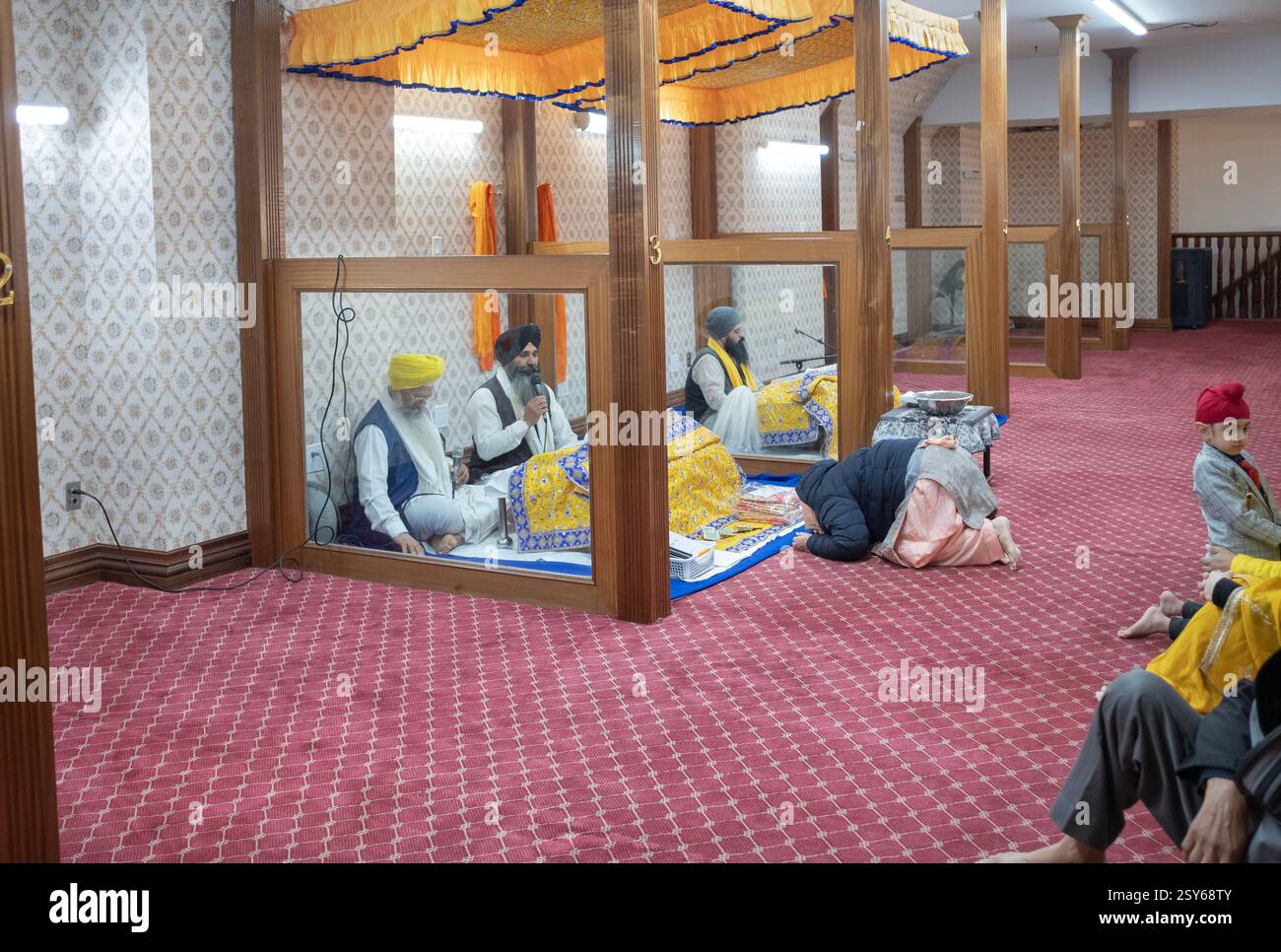 Upon entering an area in a Sikh temple where their holy book is read an ...