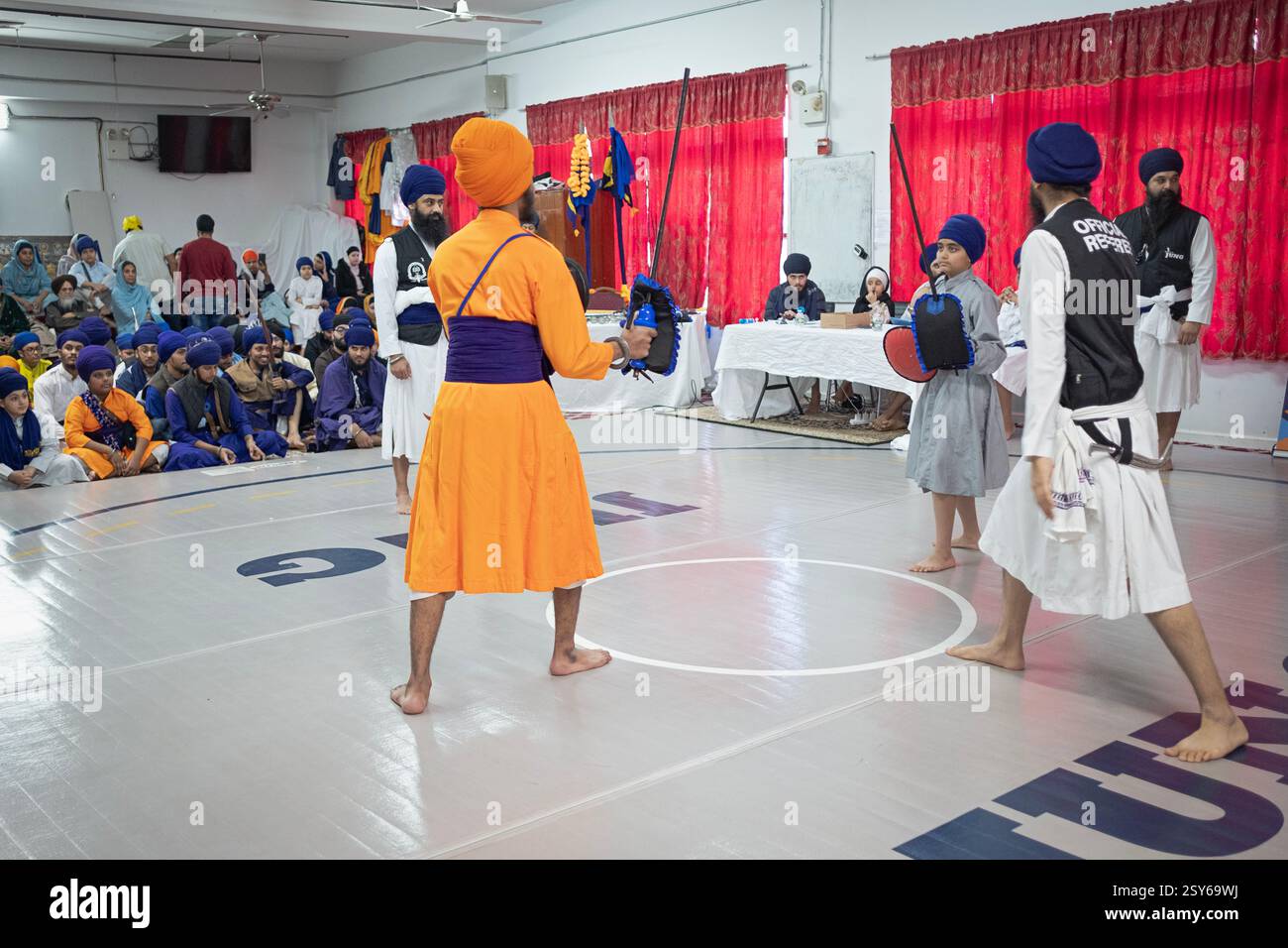A Gatka Sikh religious martial arts tournament boys compete in a ...