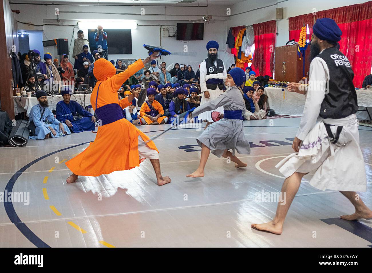 A Gatka Sikh religious martial arts tournament boys compete in a ...