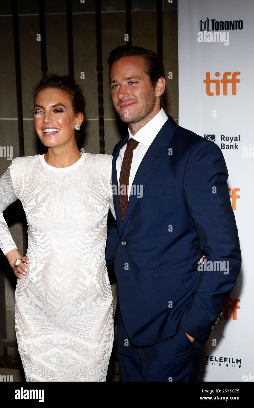 Armie Hammer and wife Elizabeth Chambers attend the premiere of Free ...