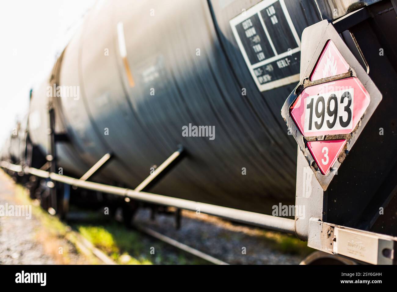 Train car with the number 1993 on it. The train car is black and red ...