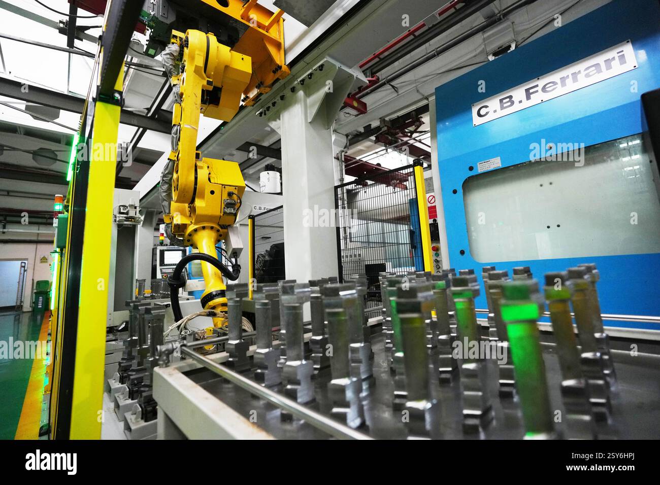 HARBIN, Feb. 27, 2025 -- A robotic arm operates at a smart production ...