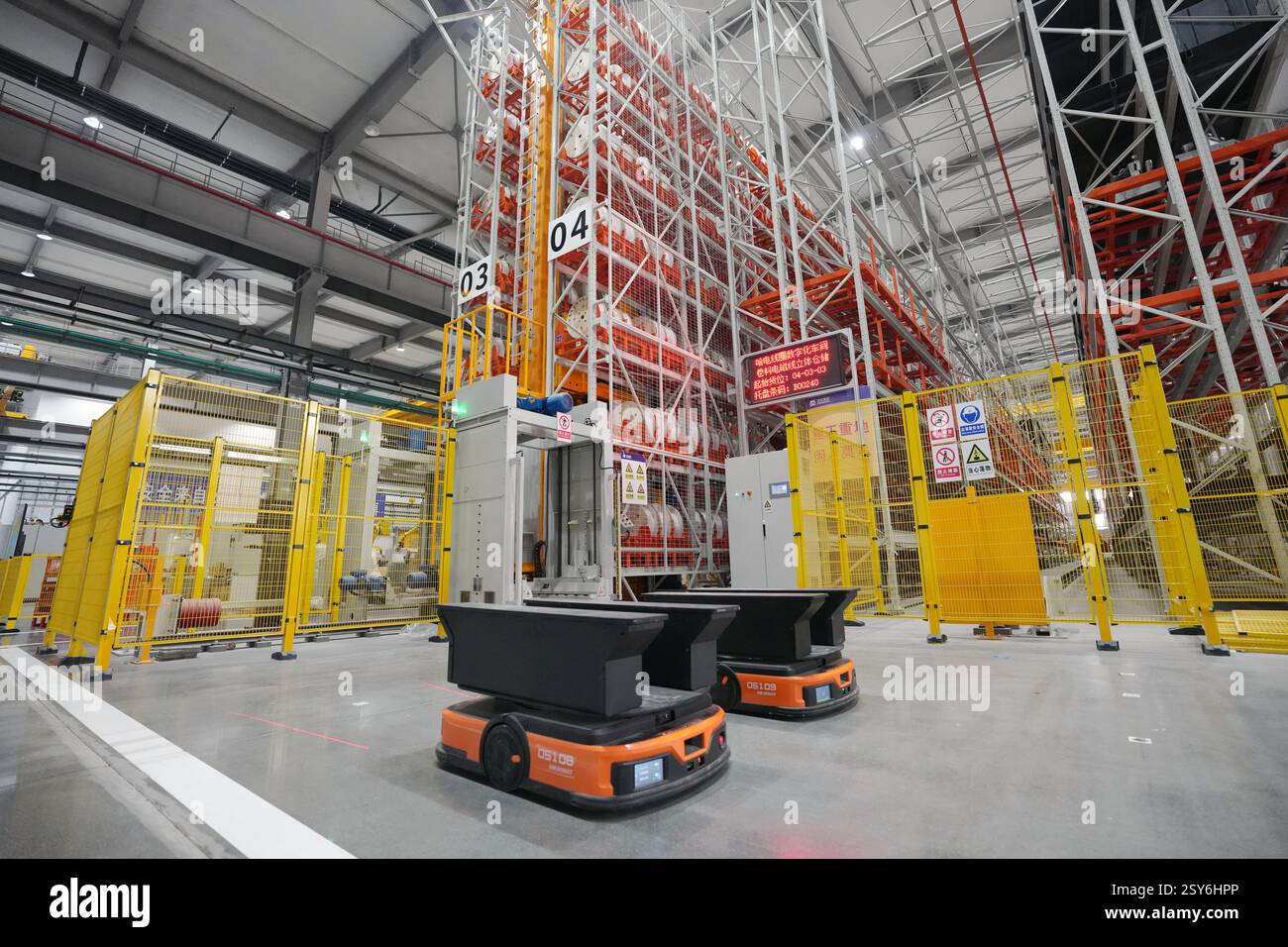 HARBIN, Feb. 27, 2025 -- Smart delivery vehicles wait for instructions ...