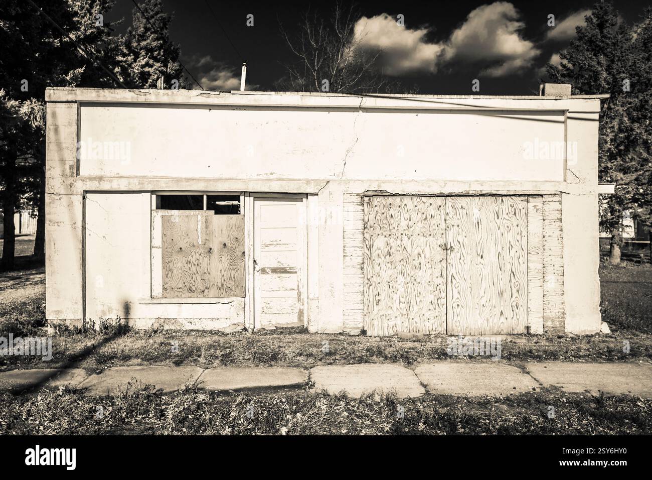 Building with a door and a window. The door is open. The building is ...