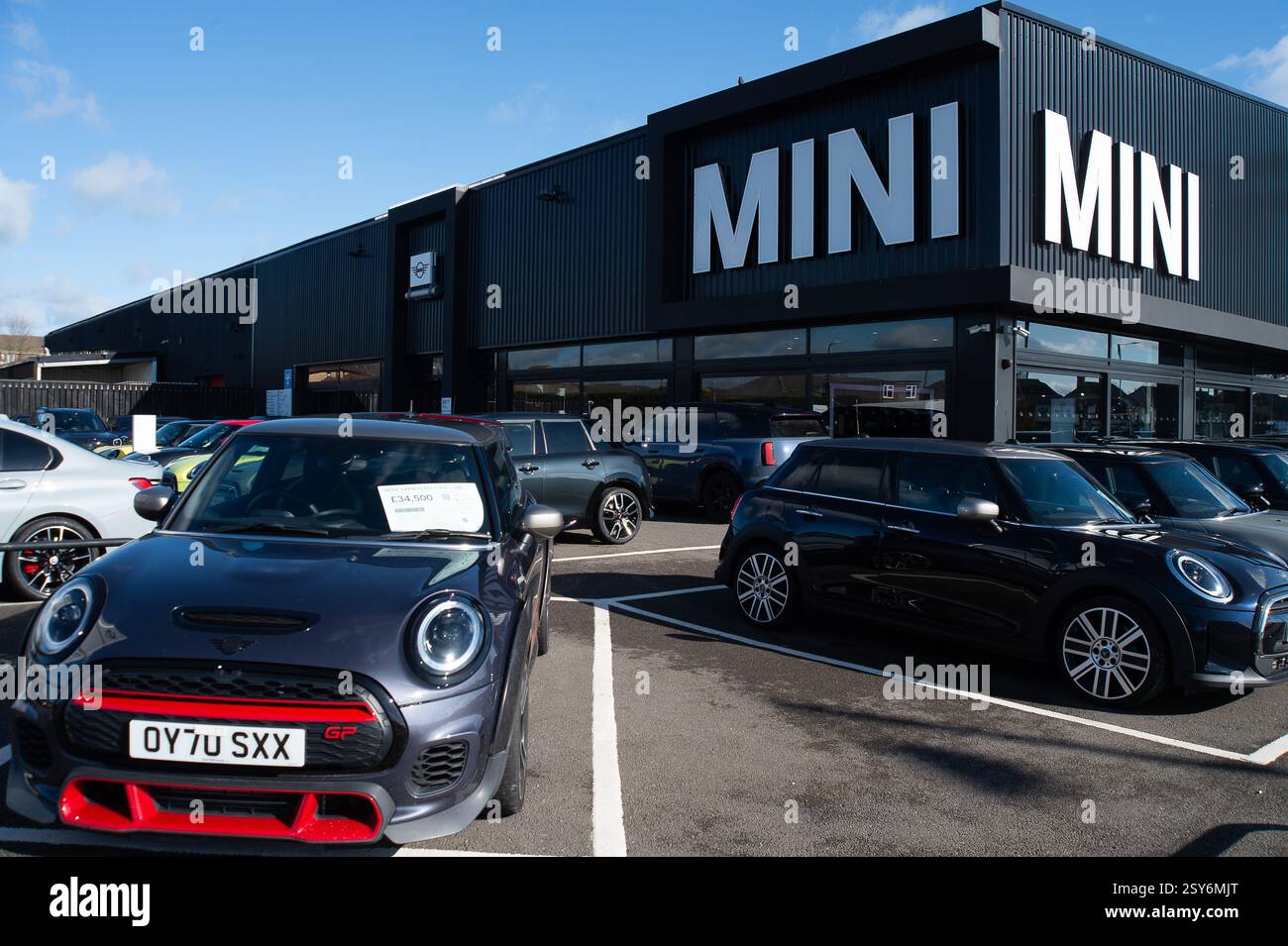 Slough, UK. 27th February, 2025. A Sytner Mini dealership and car ...
