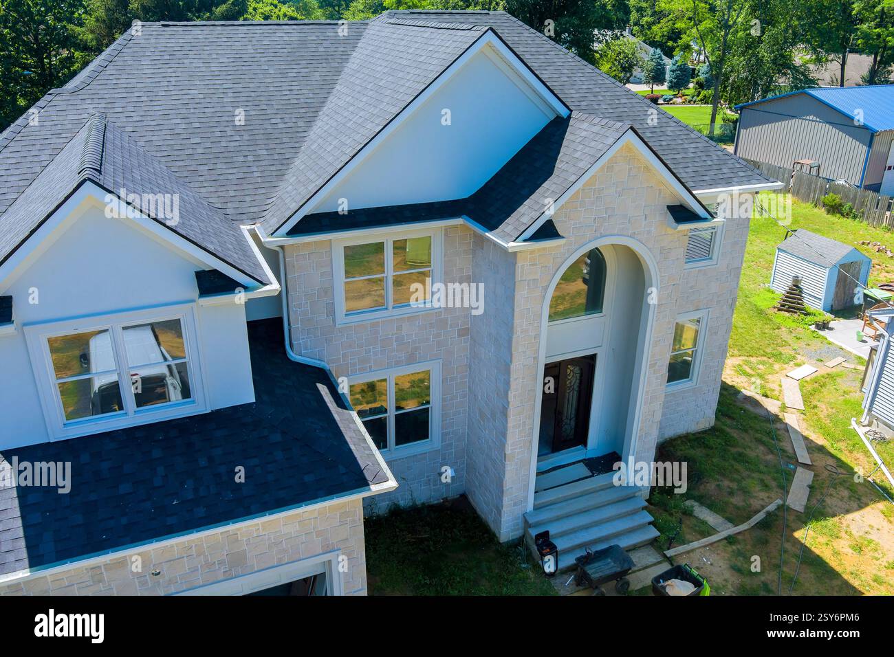 Aerial view of newly built residential property showcases contemporary ...