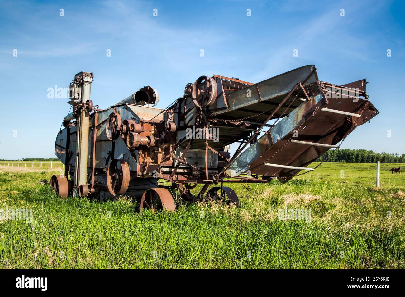 Old rusted harvester in field hi-res stock photography and images - Alamy