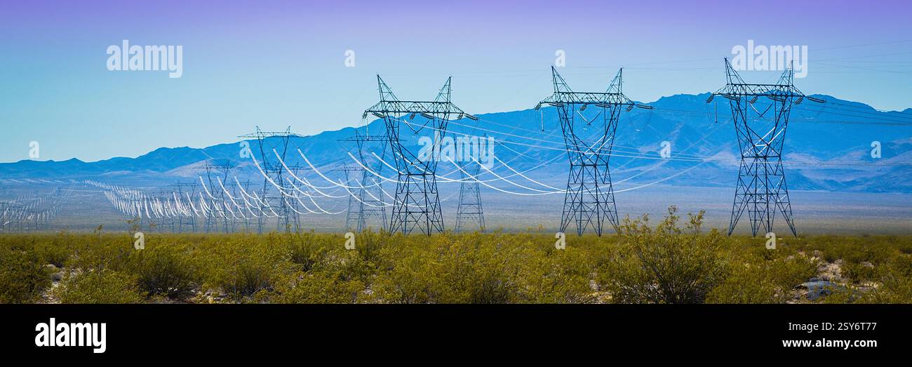 Power line tower is in the middle of a field. There are several towers ...