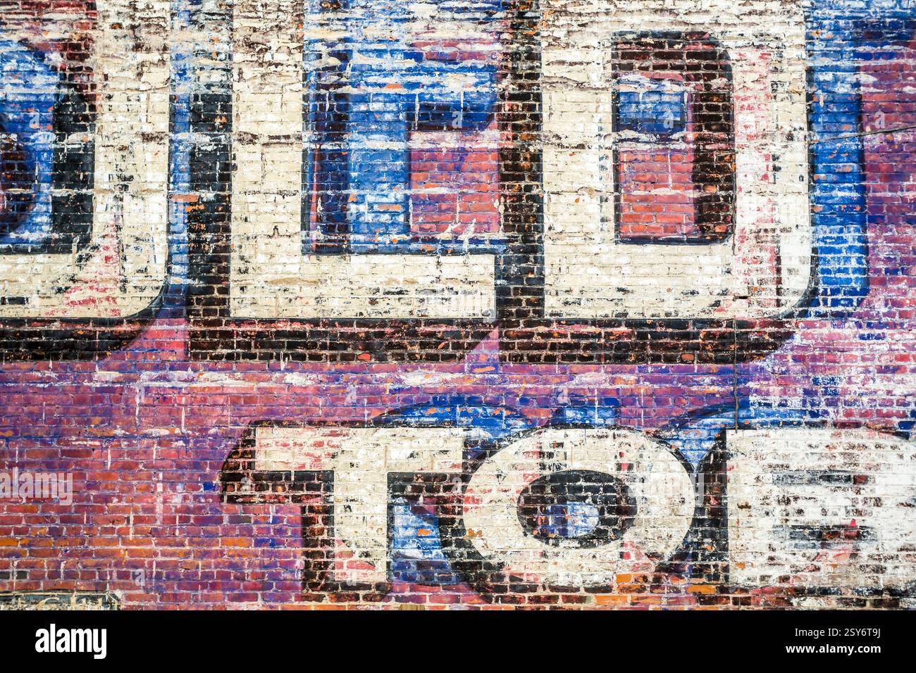 Wall with a graffiti of the word "old" on it. The word is in white ...