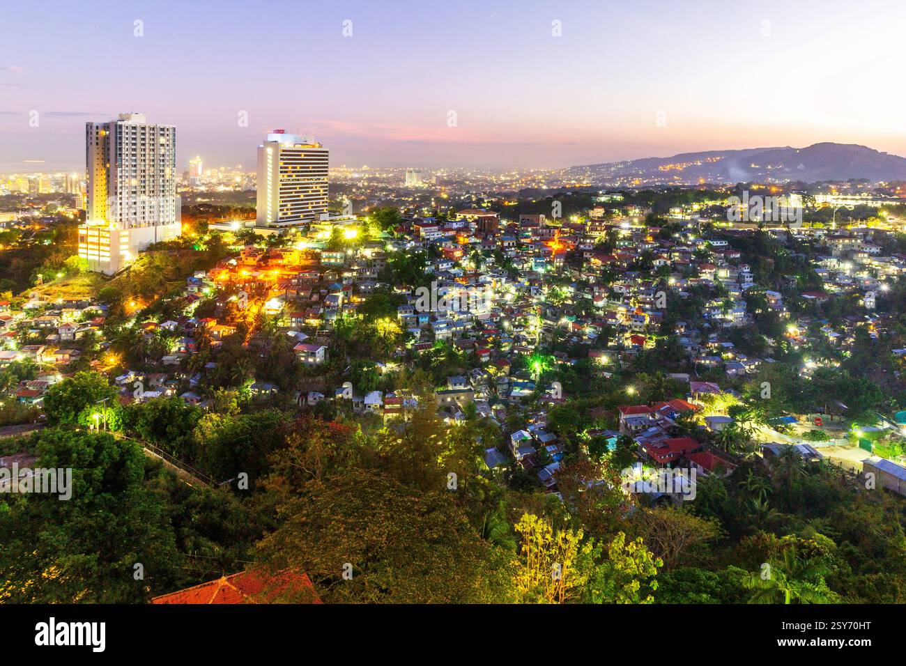 City view of Cebu City, Philippines at dusk with glowing city lights ...