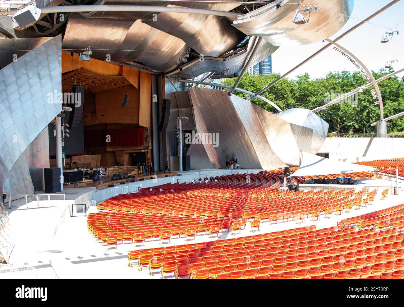 An outdoor concert venue featuring unique architectural design and a ...