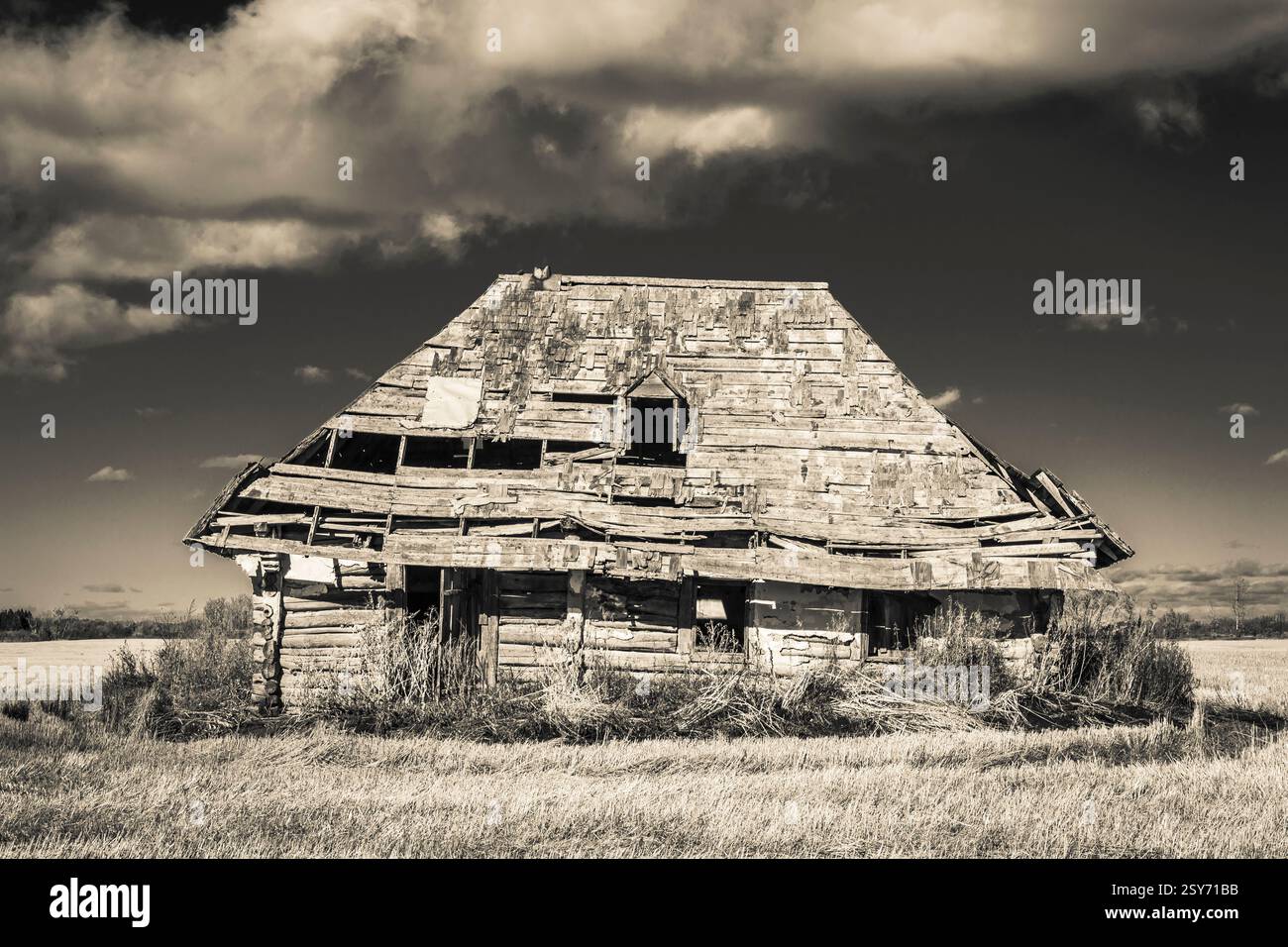 Dilapidated old house with a broken roof. The roof is missing several shingles Stock Photo - Alamy