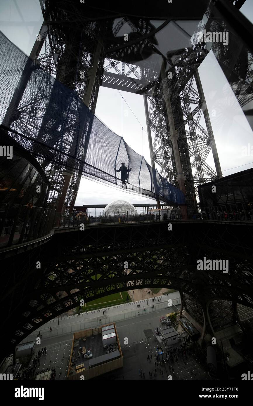 A visitor crosses the Vertigo of the Tower, an attraction made of a 40 ...