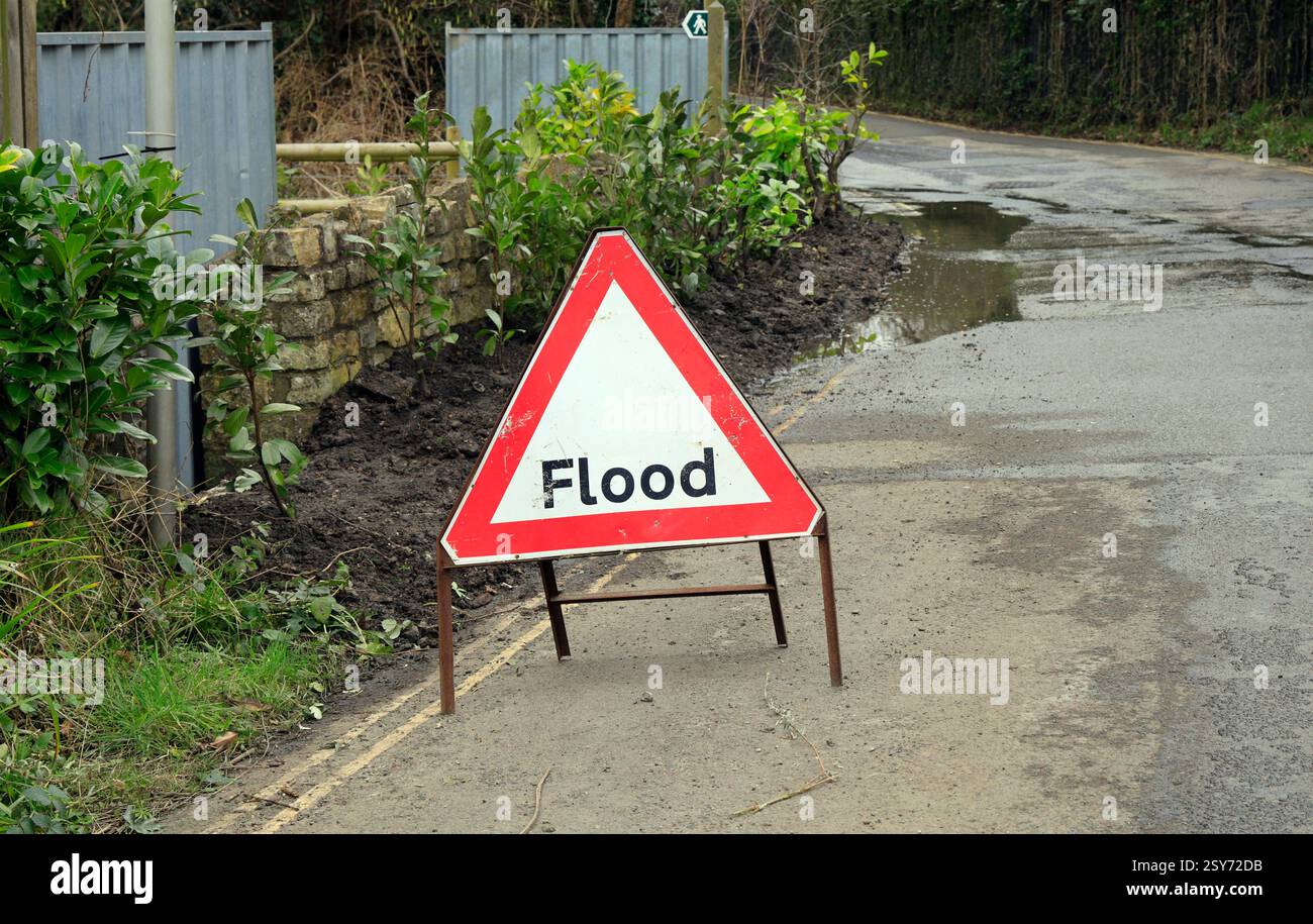 Temporary triangle flood warning sign, Saltford, near Bristol, England ...