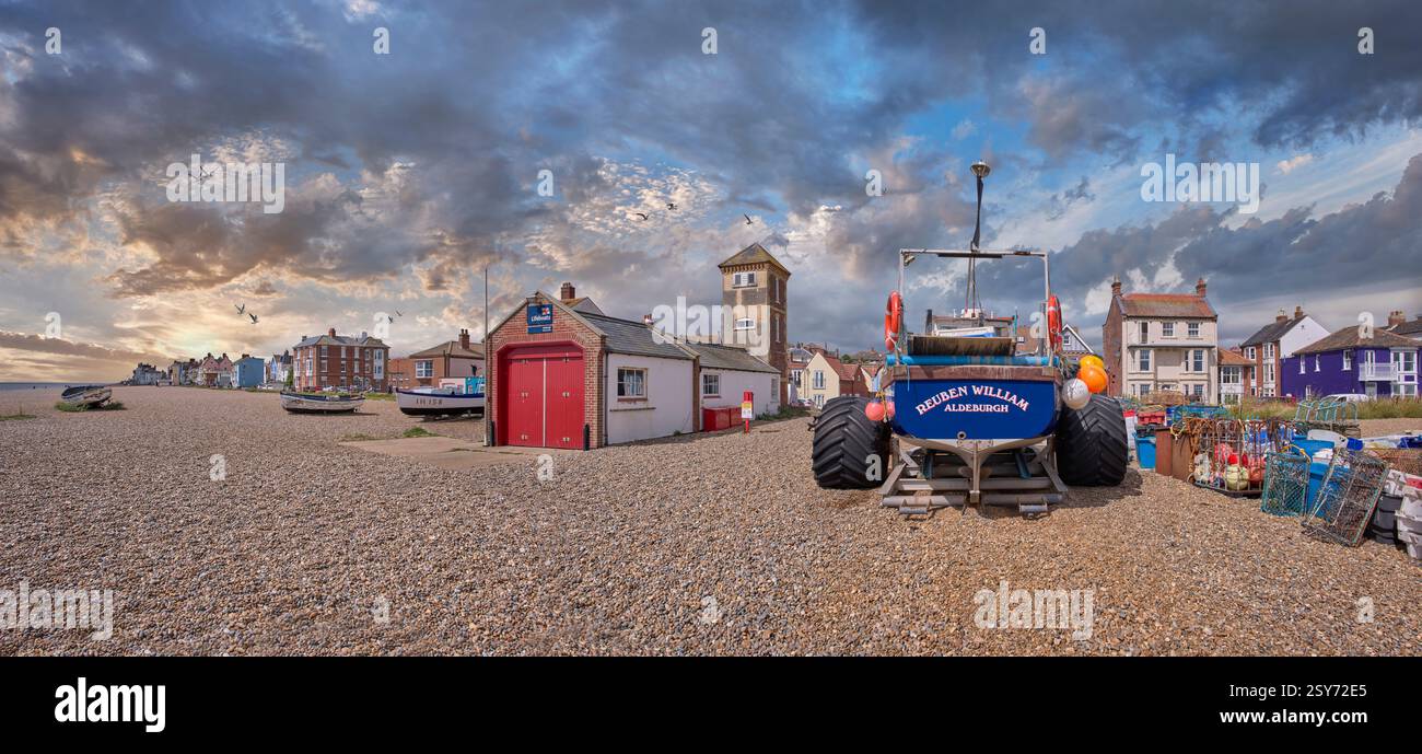 Photo of Aldeburgh shigle beach and sea front with fising boats of the ...