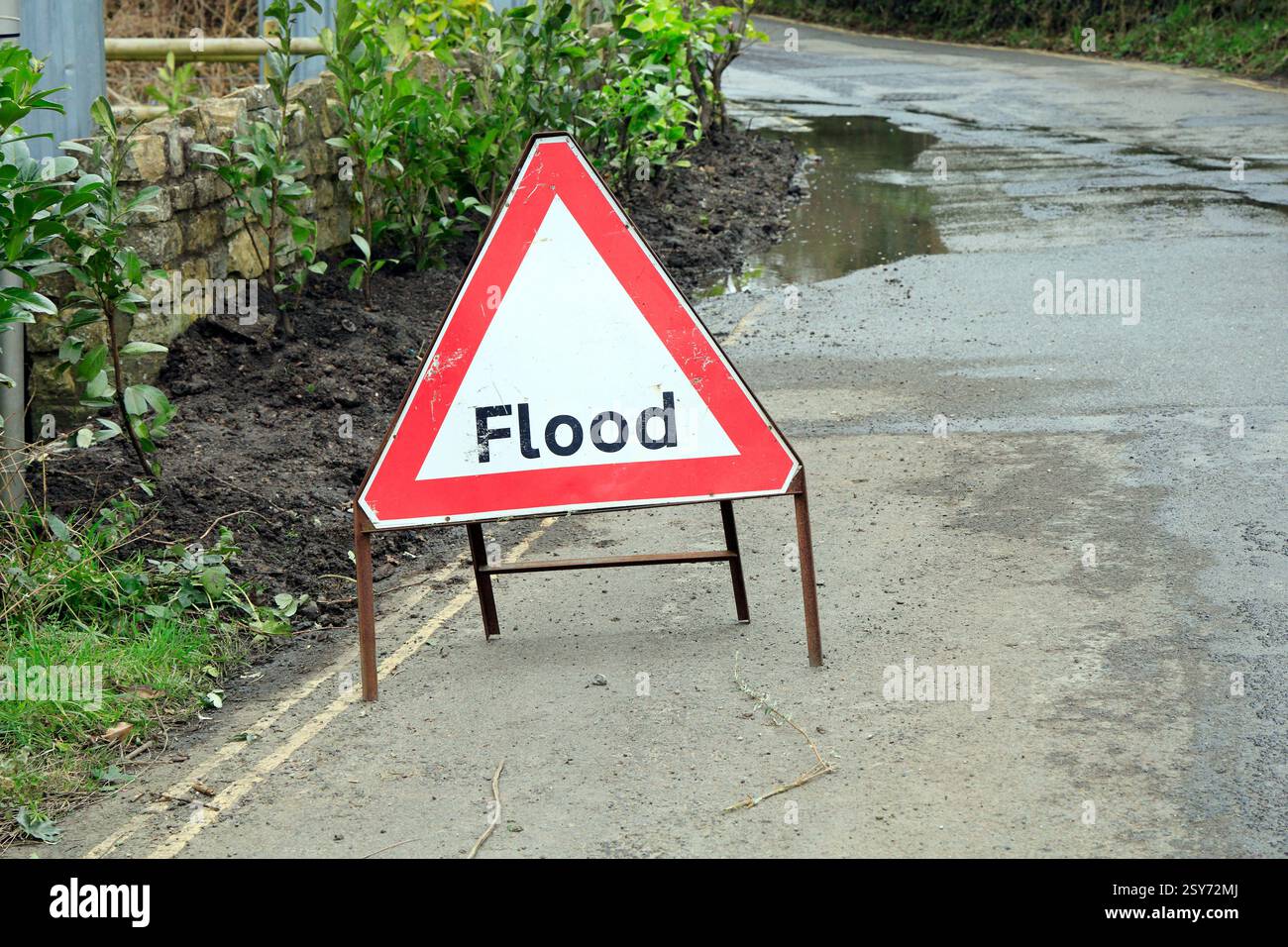 Temporary triangle flood warning sign, Saltford, near Bristol, England ...